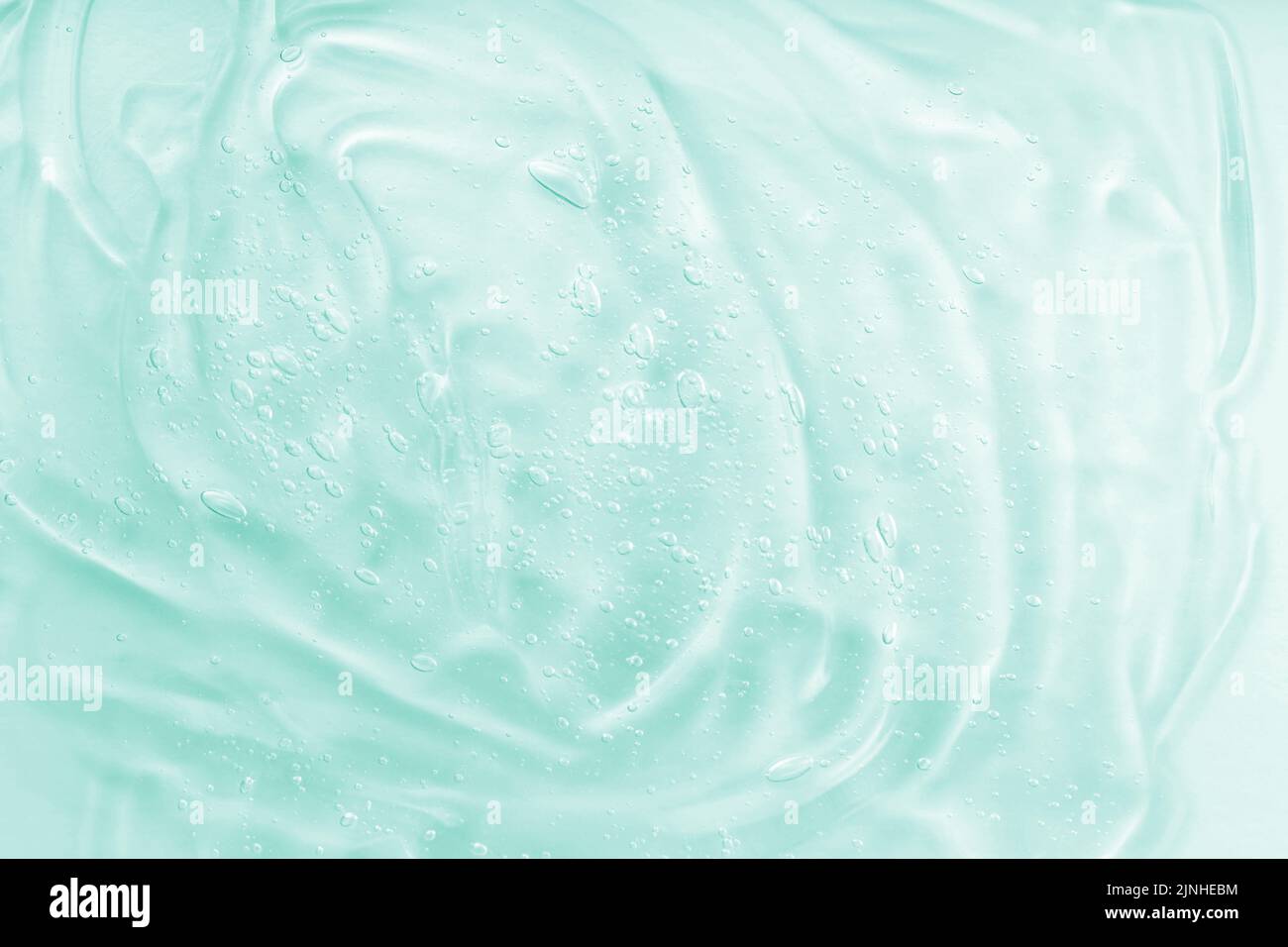 Hyaluronic acid clear serum sample. Cosmetic gel texture with bubbles ...