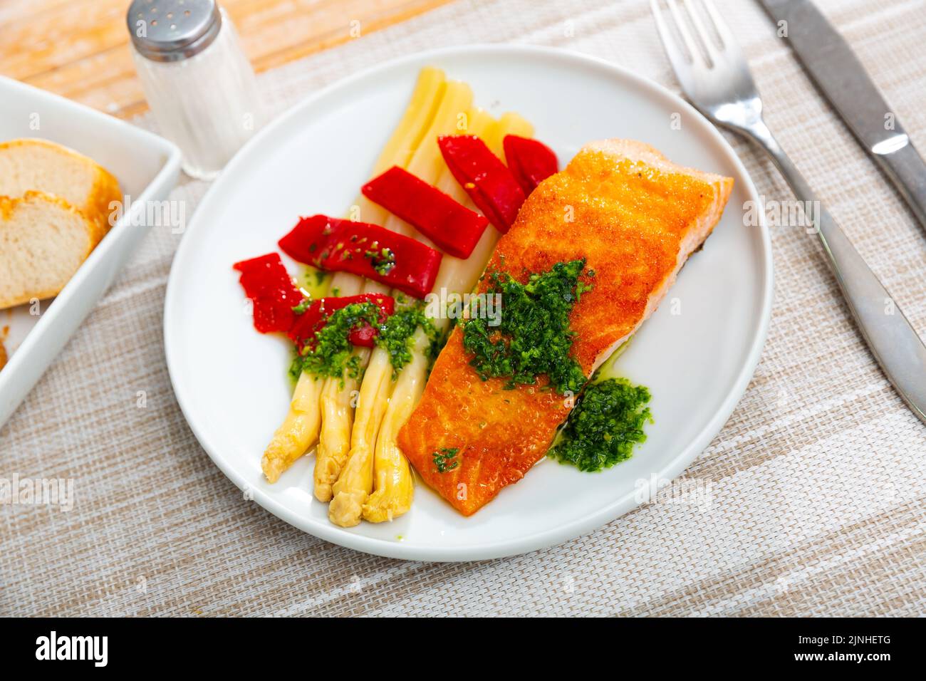 Fried salmon with asparagus and pepper Stock Photo - Alamy