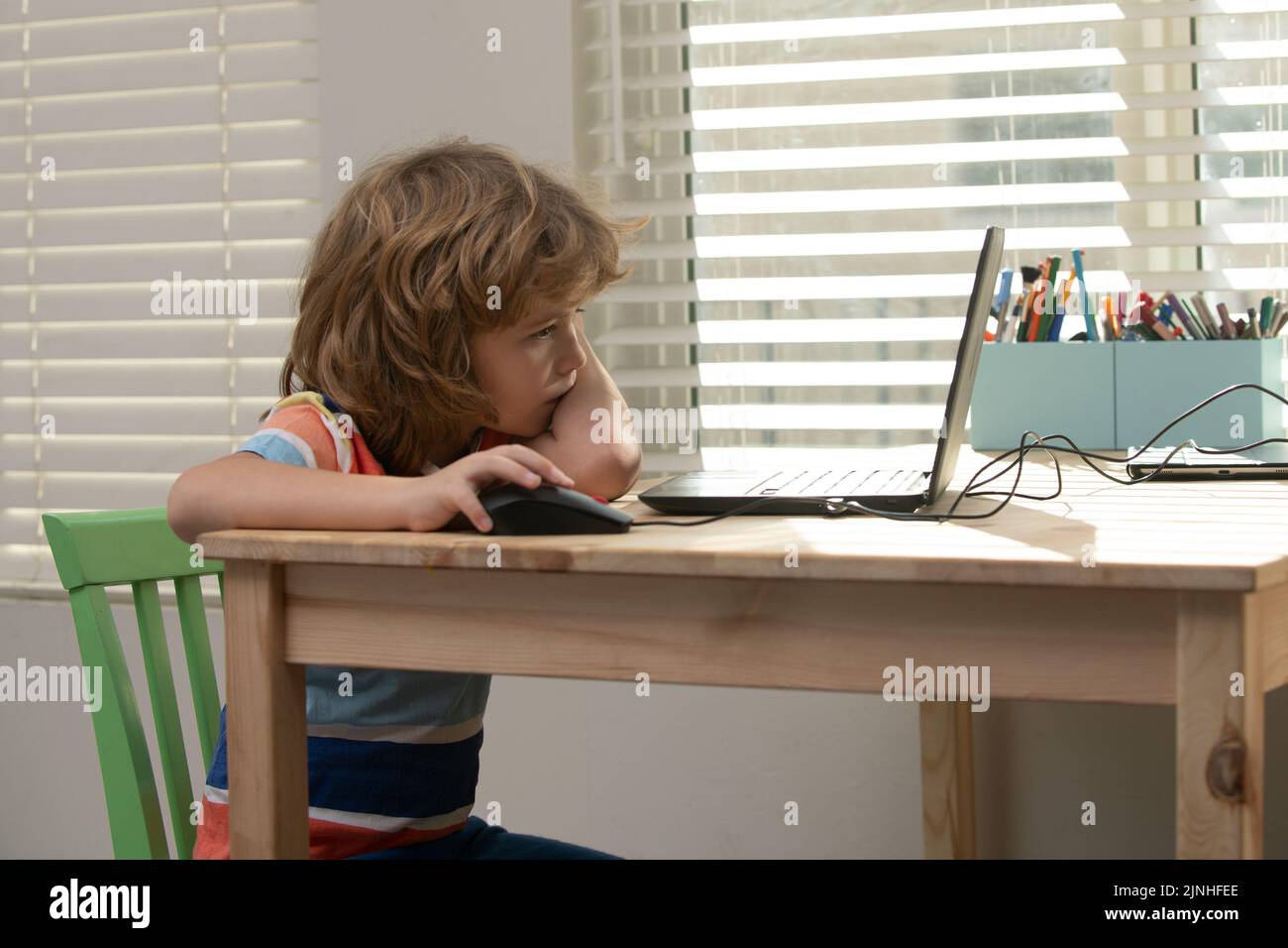 Kids education and study concept. Portrait of school boy looking at the ...