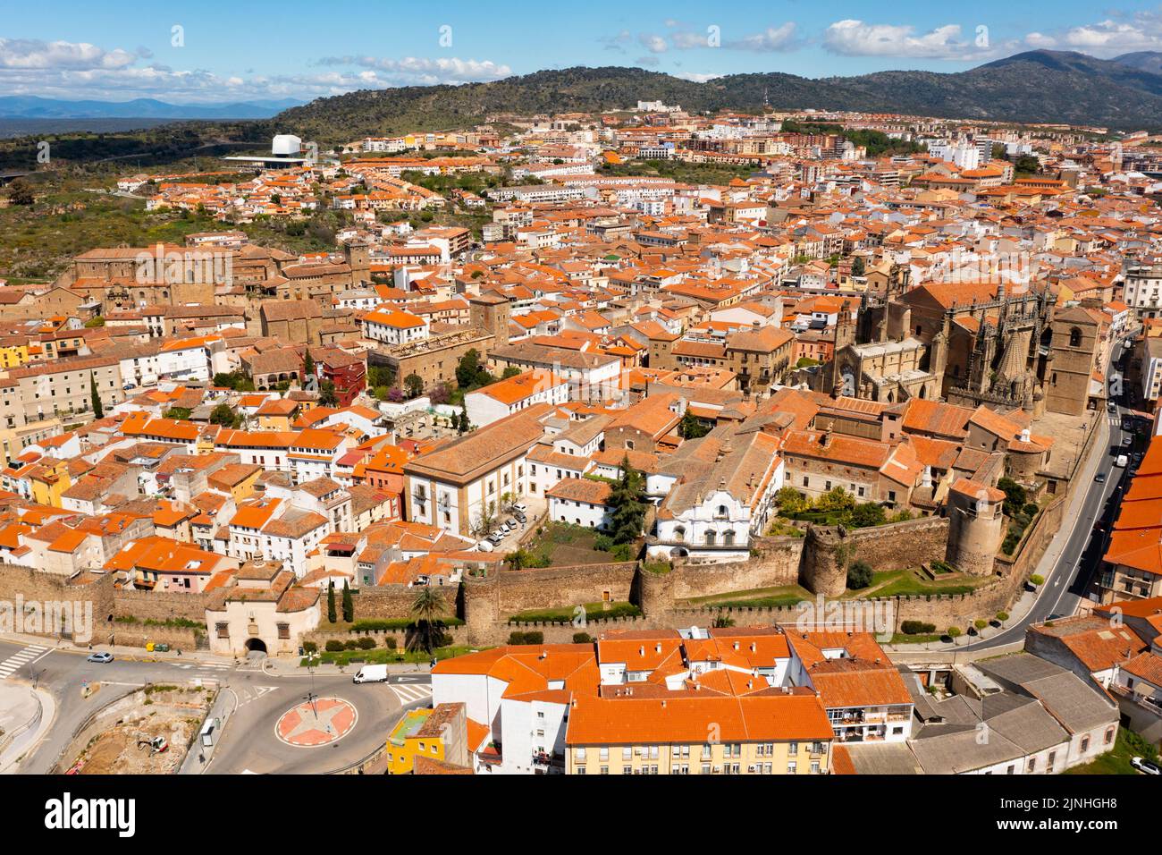 Bird's eye view of residential buildings and cathedral in Plasencia ...