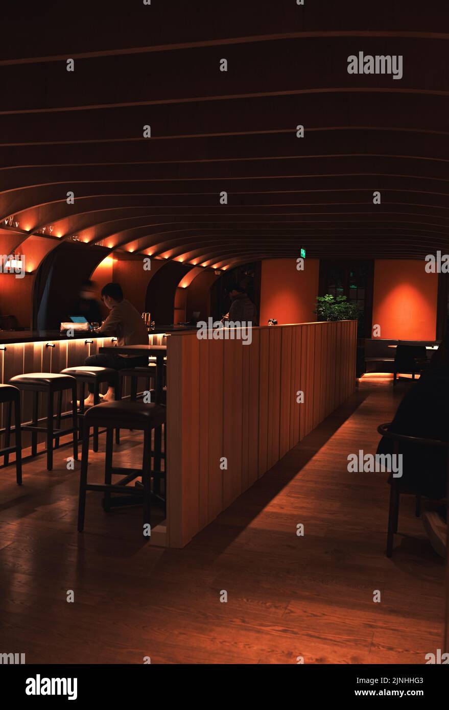 The Bar corner in the interior of the Tsutaya Books store, lit by ...