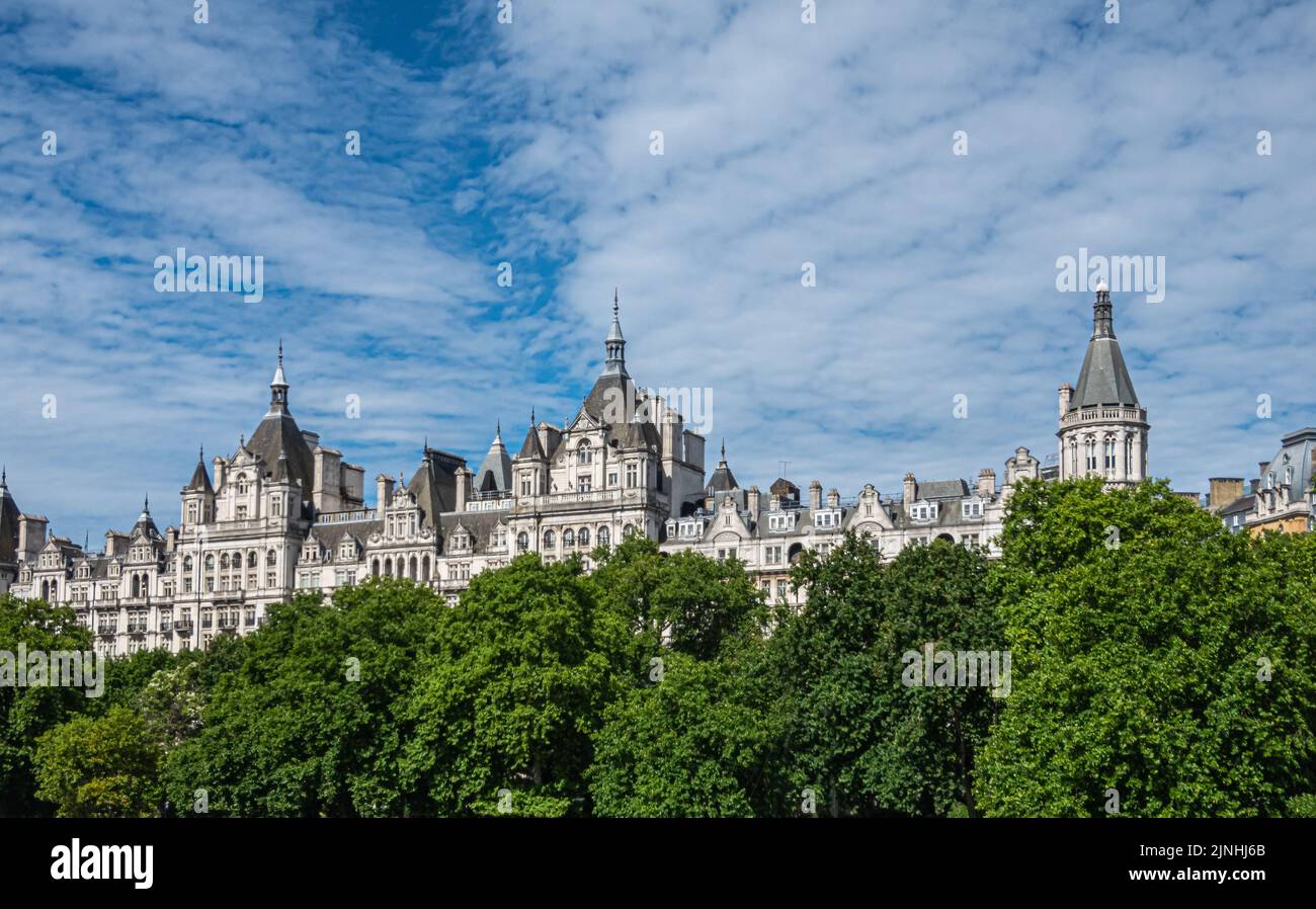 London, UK - July 4, 2022: Whitehall building peeping over belt of ...