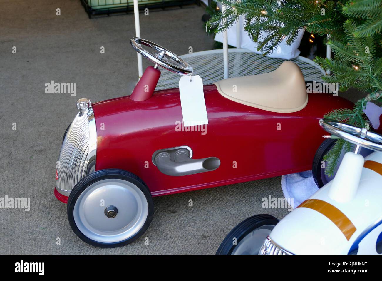 toddler's toy car under the tree Stock Photo - Alamy