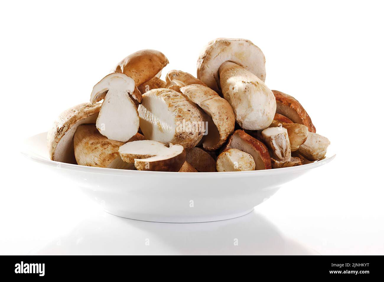 Ceps in bowl isolated on white Stock Photo - Alamy