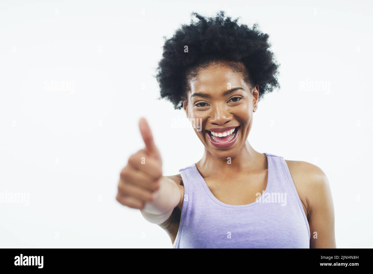 Youre good to go. Studio shot of an attractive young woman posing with ...