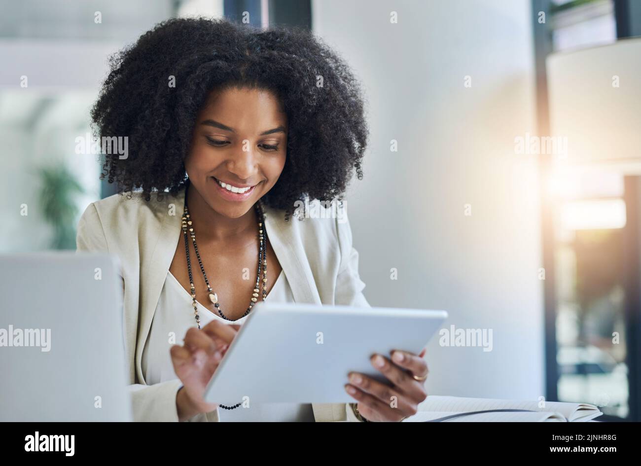 This app really helps me run things a bit easier. a young businesswoman ...