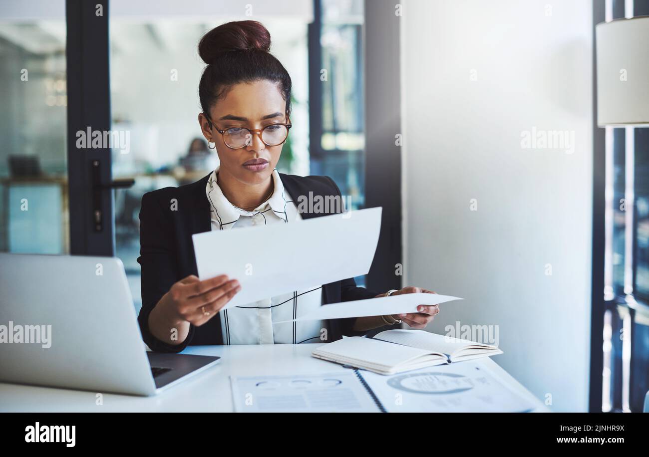 How she makes success happen. a young businesswoman going through ...