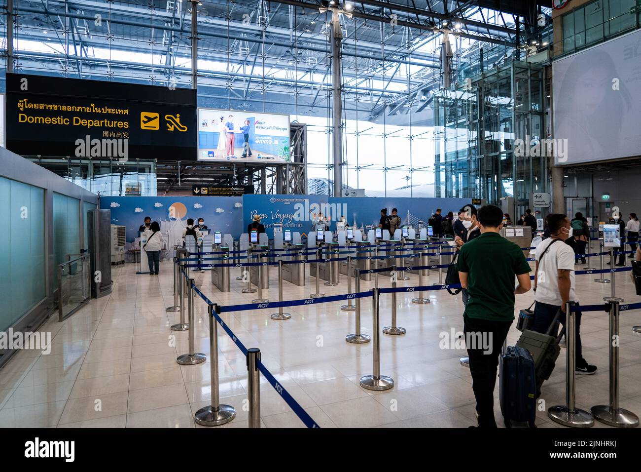 Bangkok, Thailand. 12th Aug, 2022. Passengers walk through the queue ...