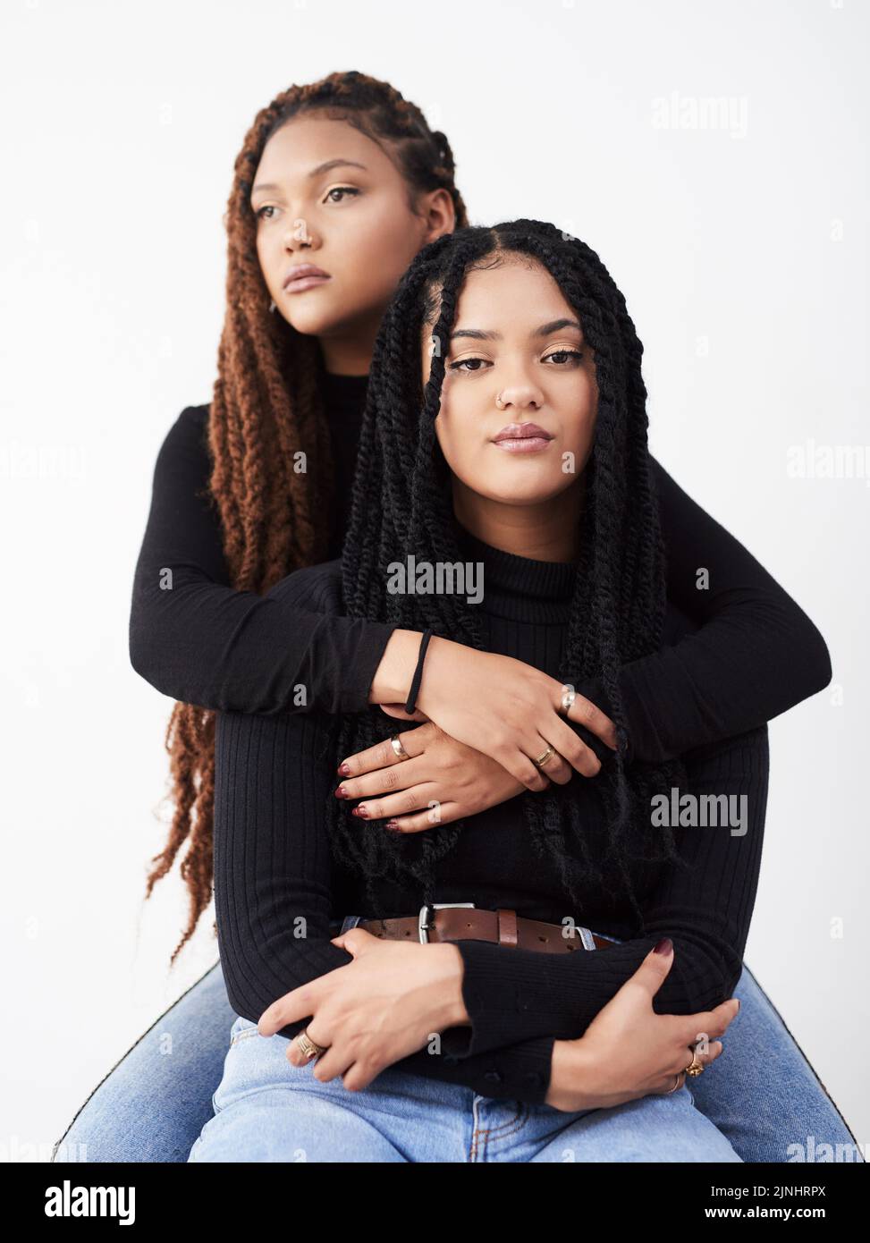 They have so much love for each other. Studio shot of two beautiful ...