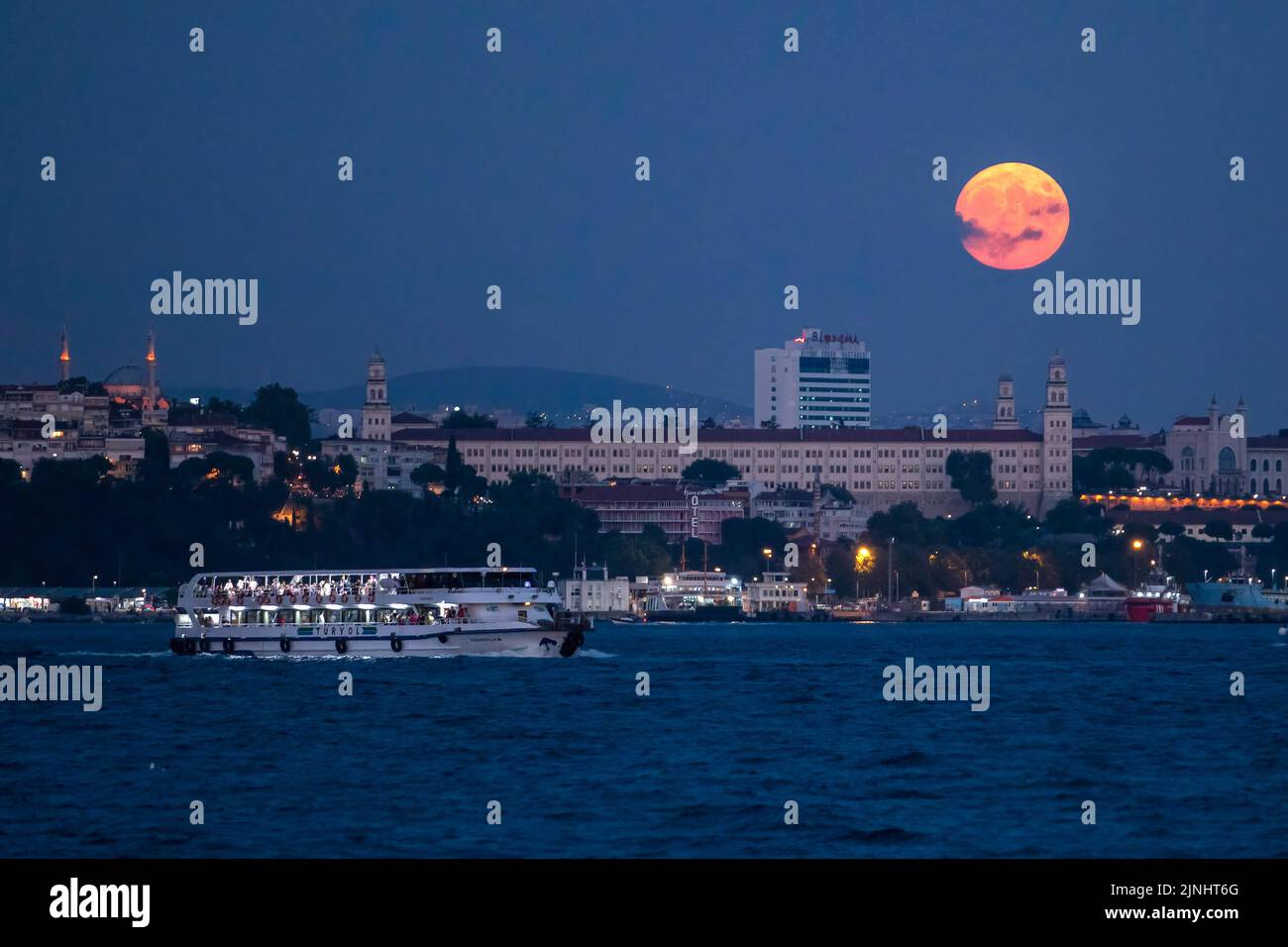 Istanbul, Turkey. 11th Aug, 2022. With the full moon appearing over ...