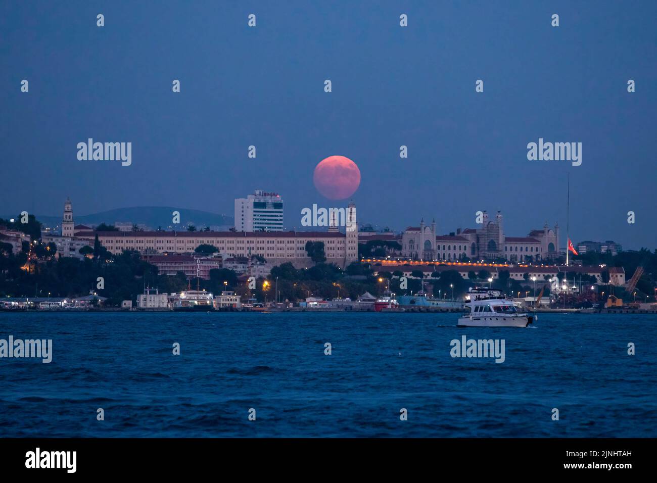 Istanbul, Turkey. 11th Aug, 2022. With the full moon appearing over ...
