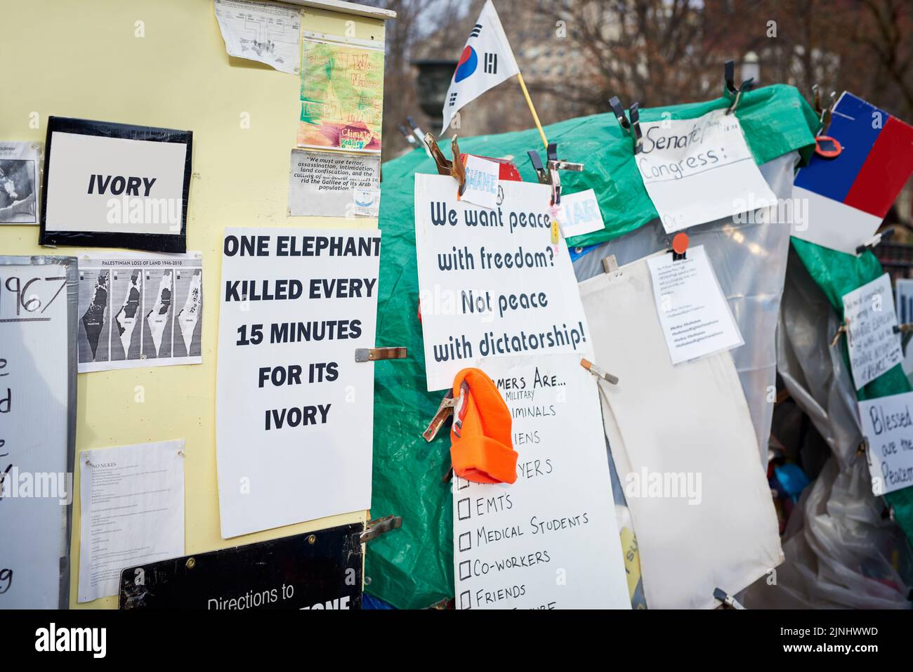 Put your voice on the wall. a bunch of signs all grouped together Stock ...