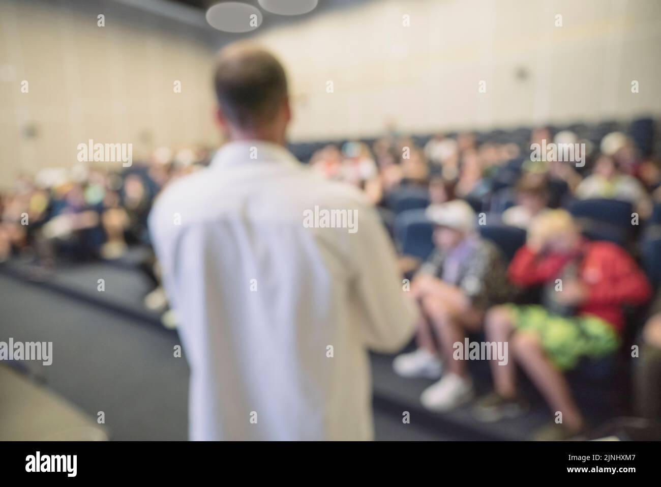 Abstract blurred people lecture in seminar room, education concept ...