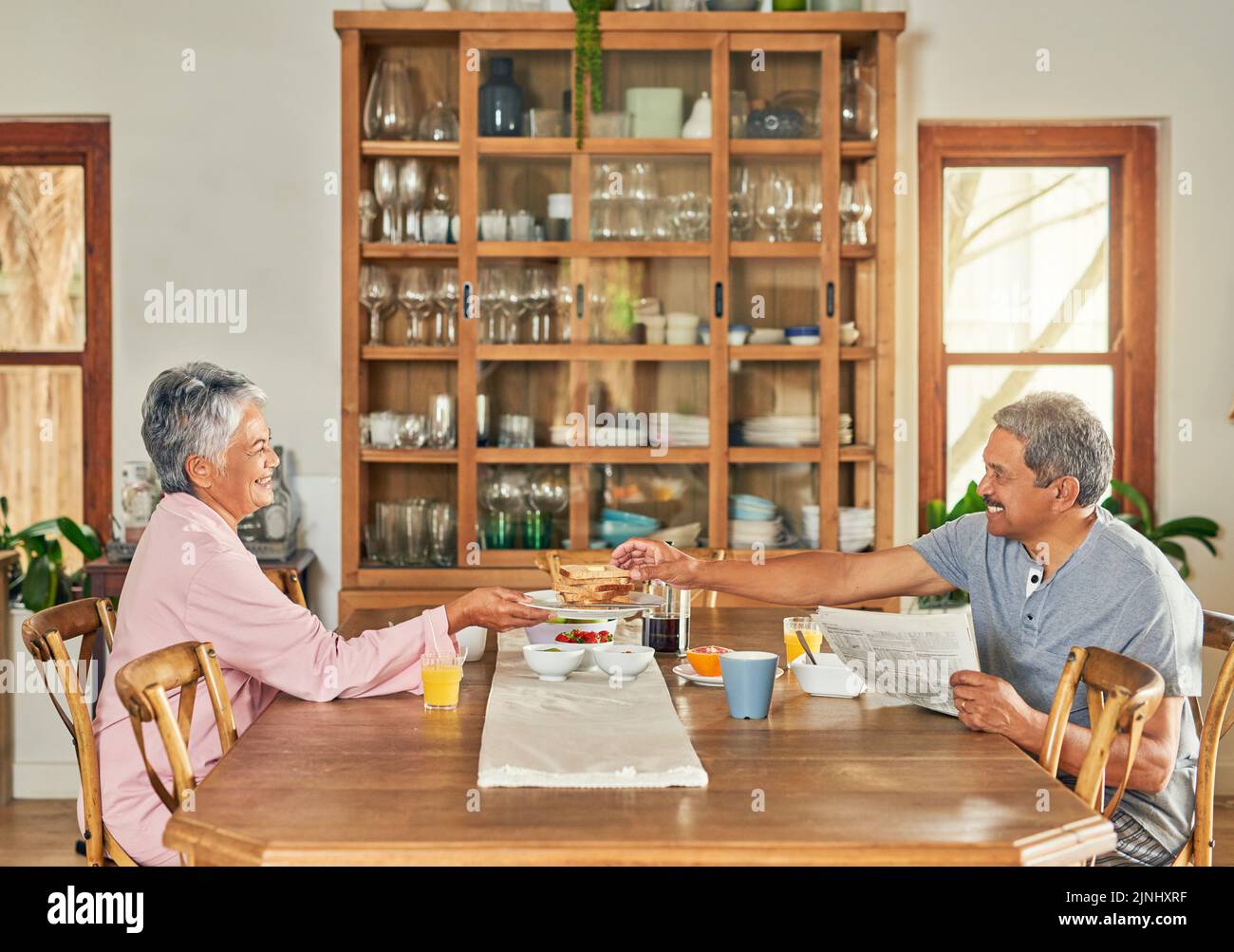 Elderly couple drinking toast hi-res stock photography and images - Alamy