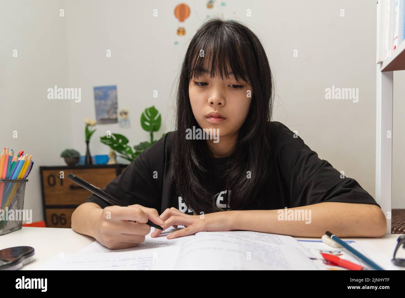 Asian college girl sitting class hi-res stock photography and images ...