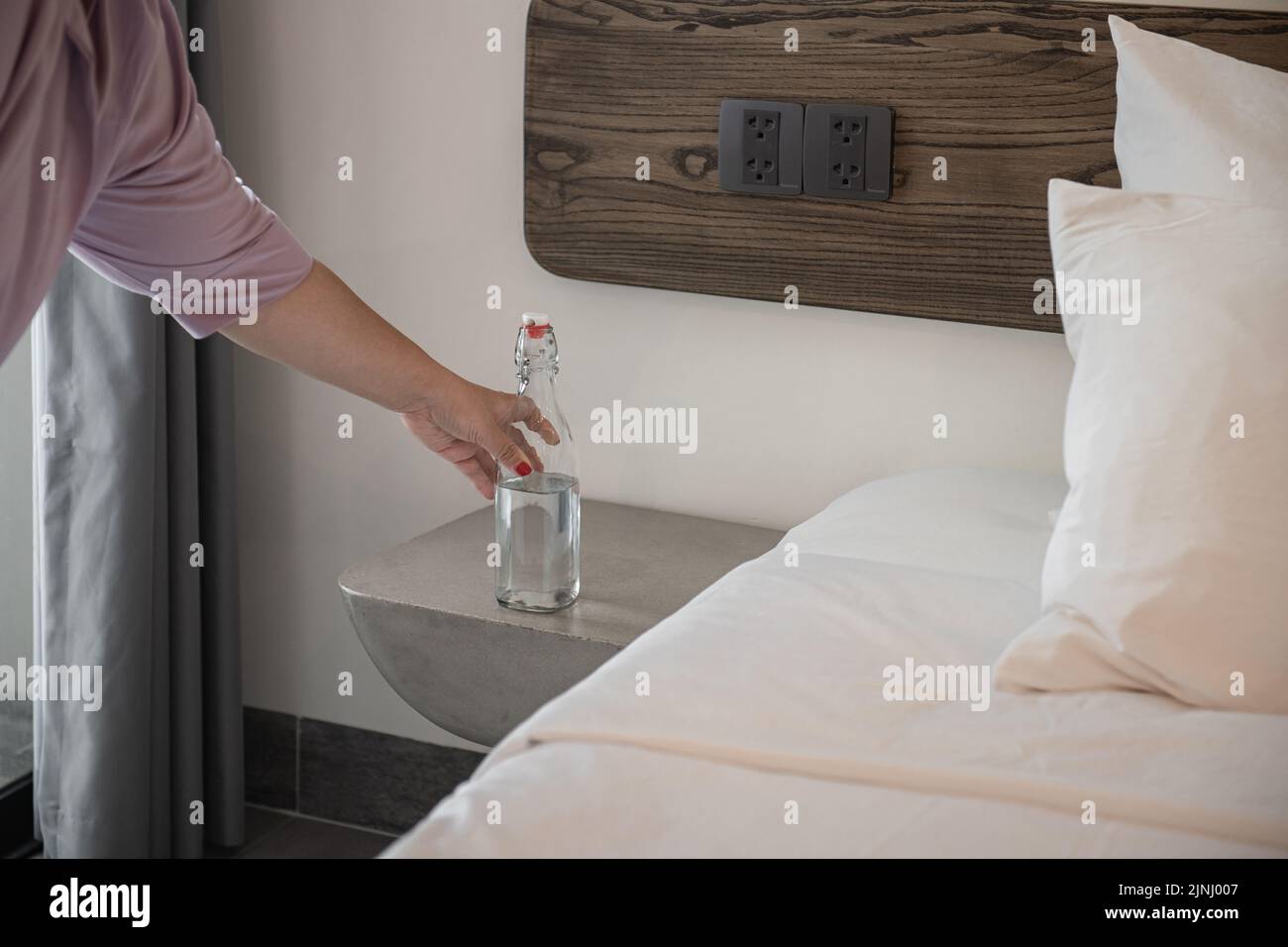 Asian woman worker working in hotel and resort Stock Photo - Alamy