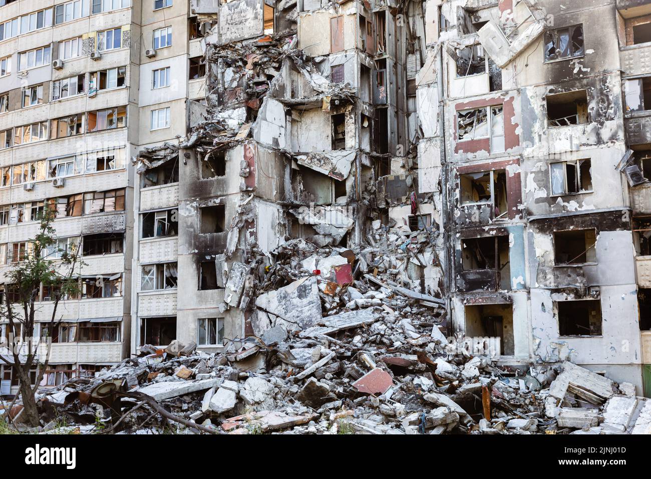 A completely destroyed residential apartment building as a consequence ...