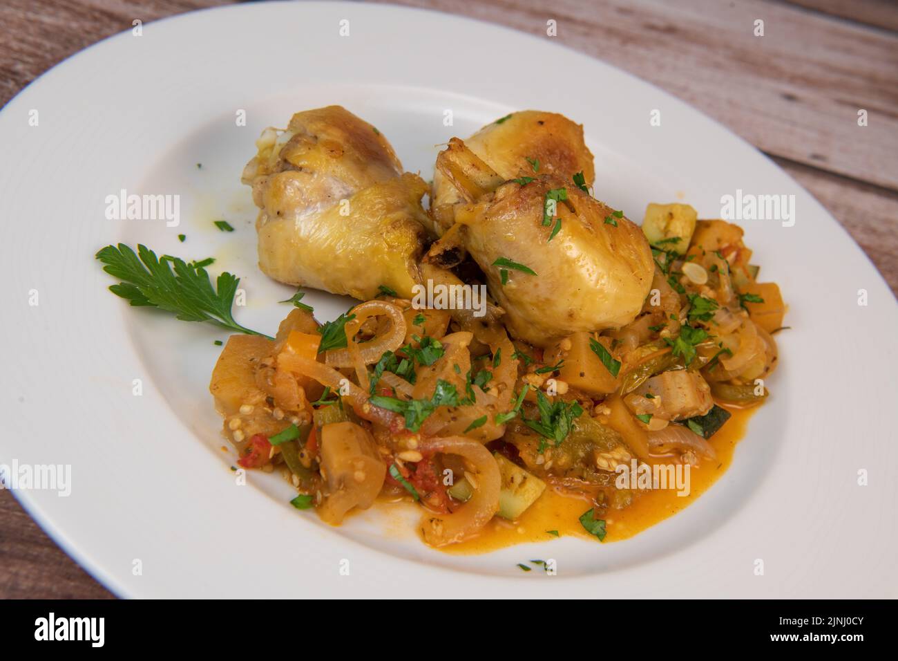 Delicious chicken with oven-roasted ratatouille vegetables Stock Photo ... Delicious chicken with oven-roasted ratatouille vegetables Stock Photo ...
