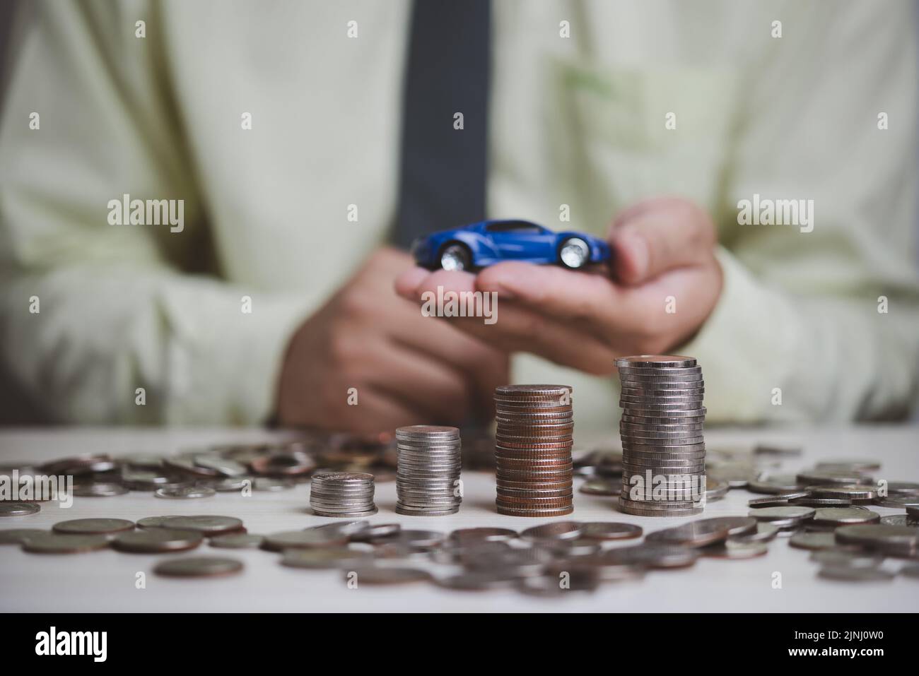 Car coin stack hi-res stock photography and images - Alamy