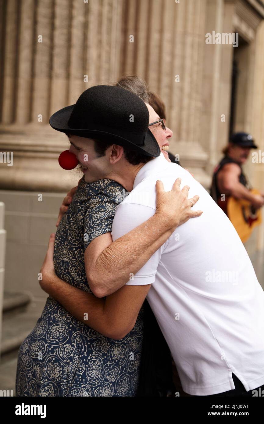 clown hugging lady Stock Photo - Alamy