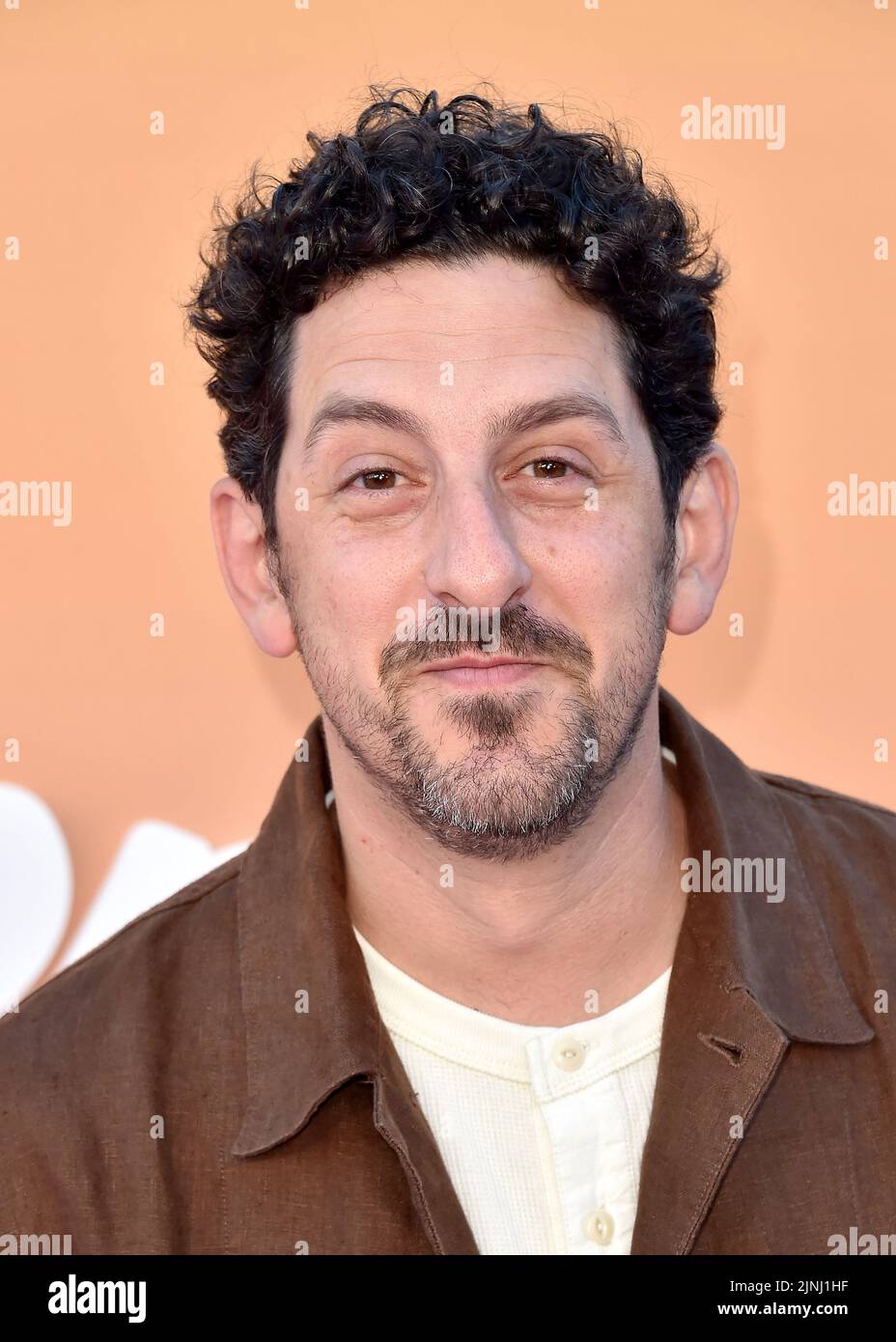 Adam Shapiro walking on the red carpet at the Los Angeles premiere of ...