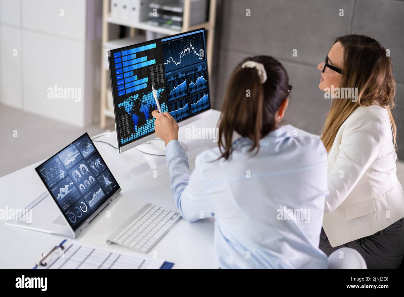 Analyst Woman Looking At Business Data Analytics Dashboard Stock Photo ...