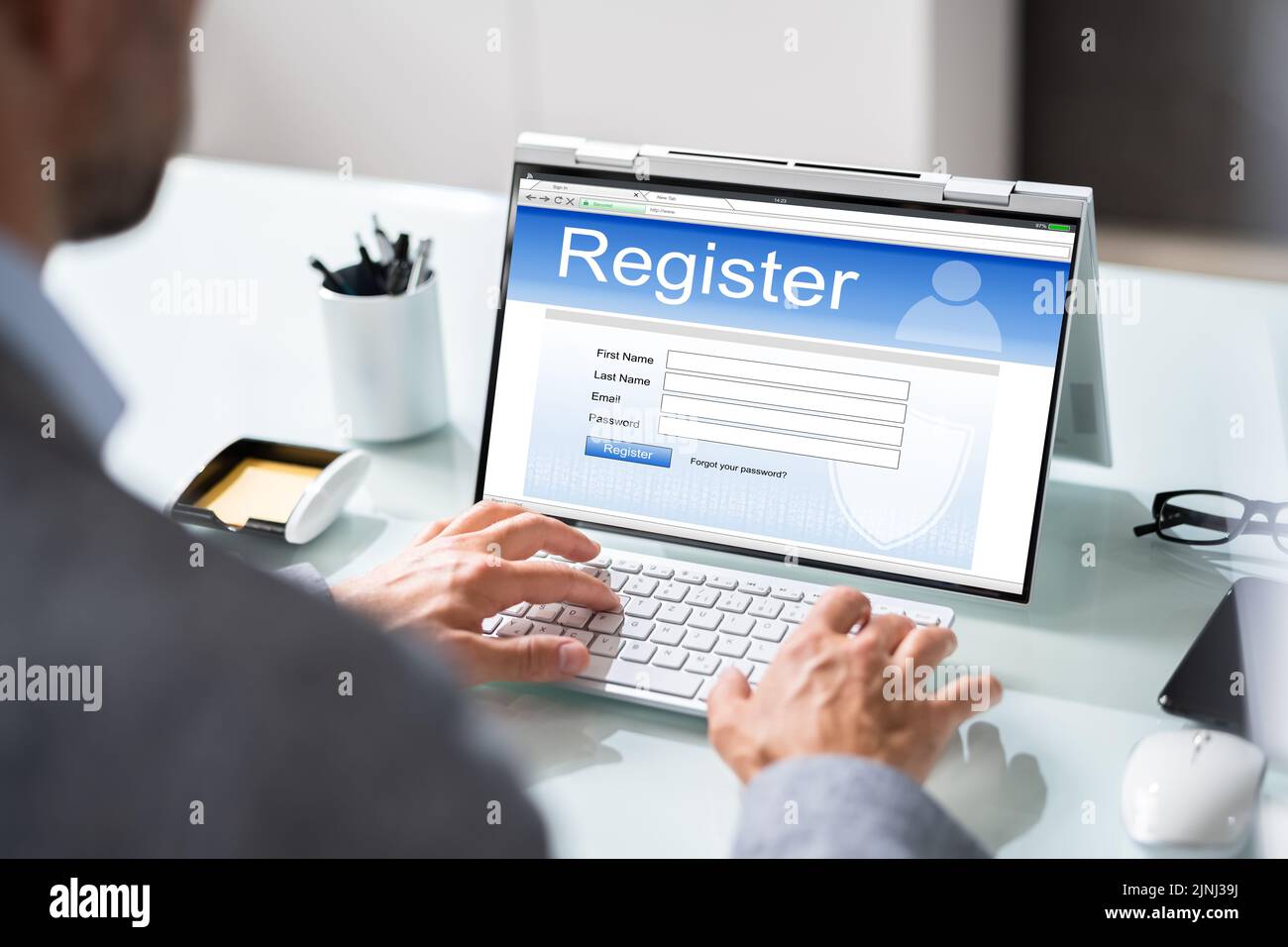Online Web Registration Form On Website Using Laptop Stock Photo - Alamy