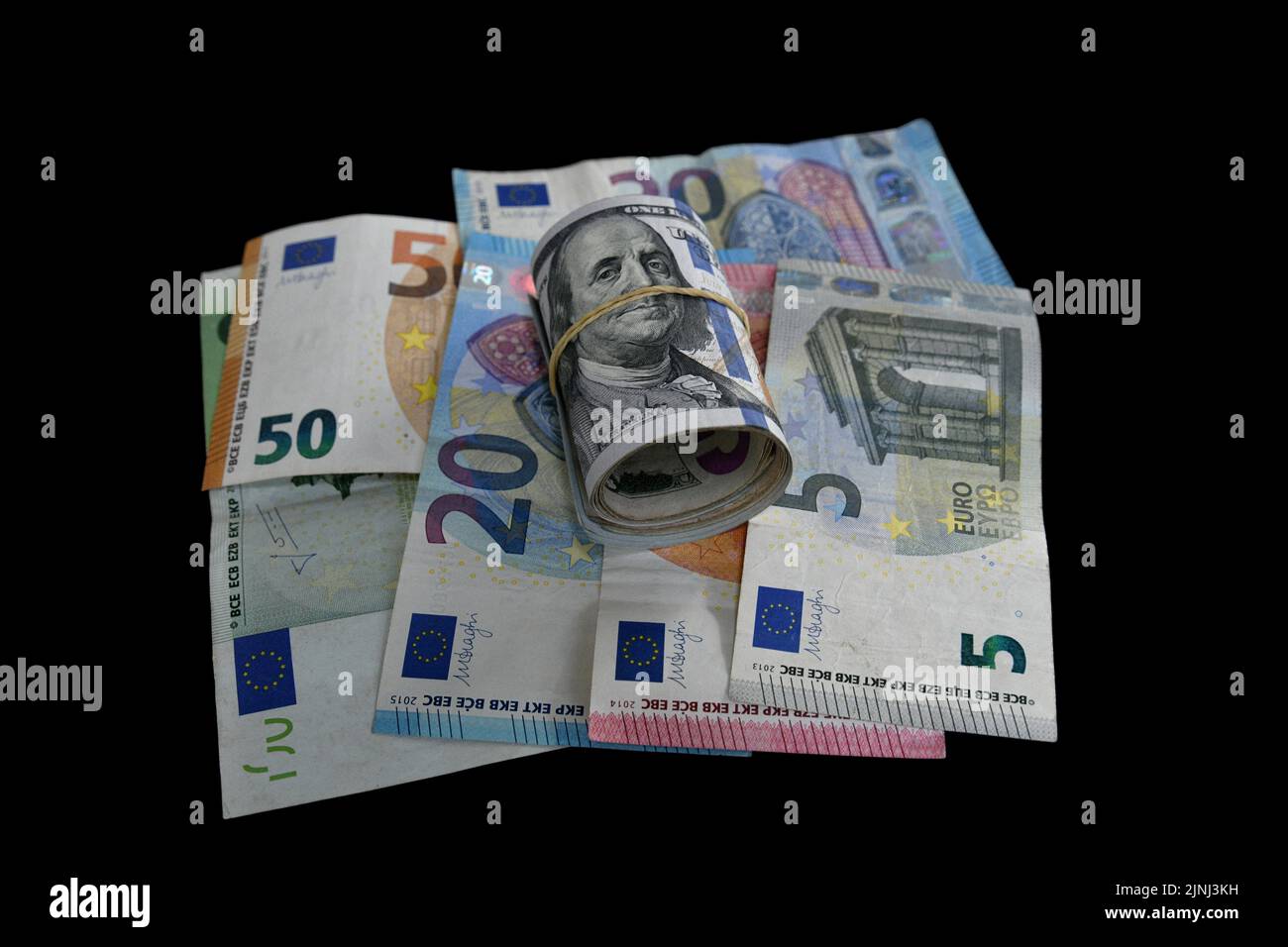 Pictures of the currencies of the euro against the dollar. The value of ...