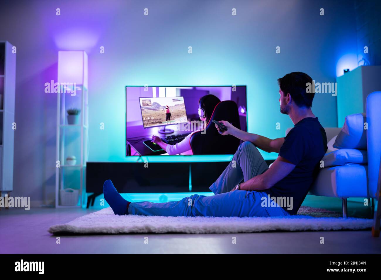 Streaming And Watching Movie On TV Screen Stock Photo - Alamy