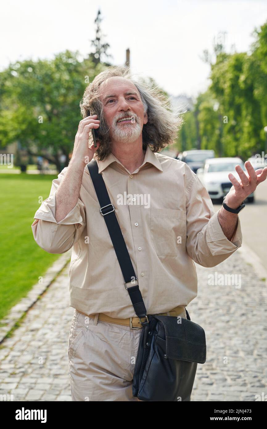 Middle age man standing typing hi-res stock photography and images - Alamy