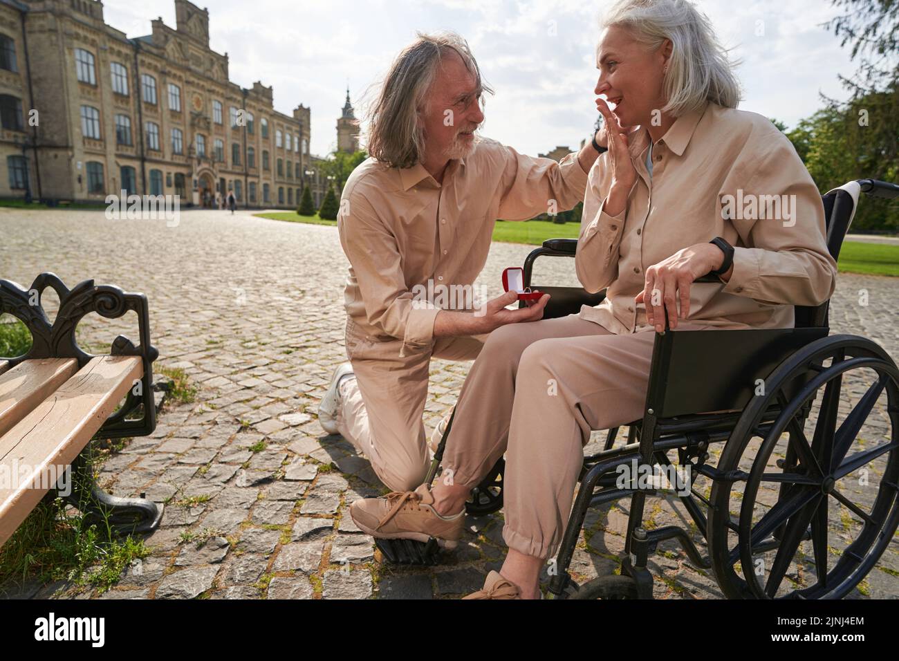 Surprised disabled woman getting wedding ring for present Stock Photo ...