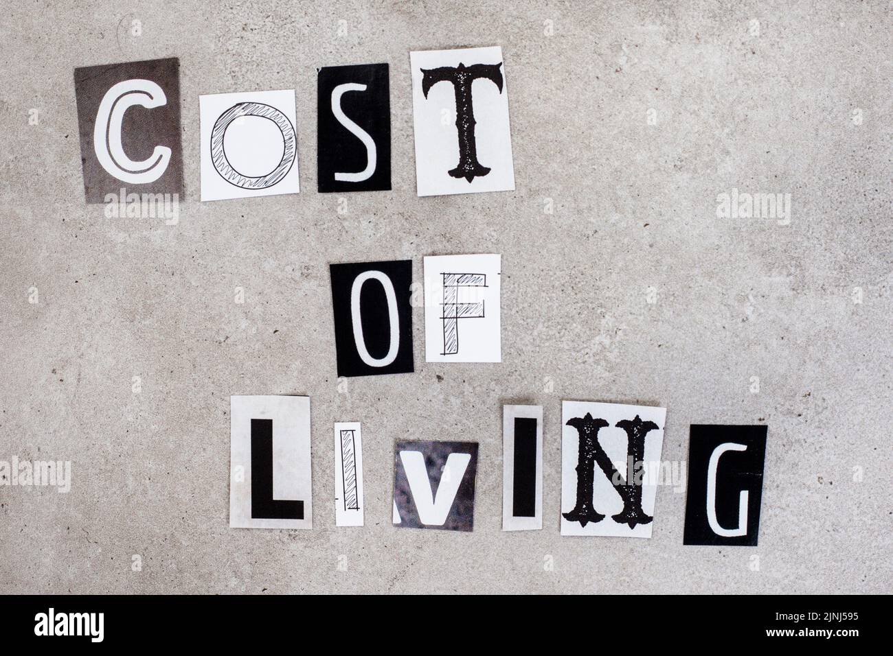 Cost of living, written with lettering from magazine clippings on ...