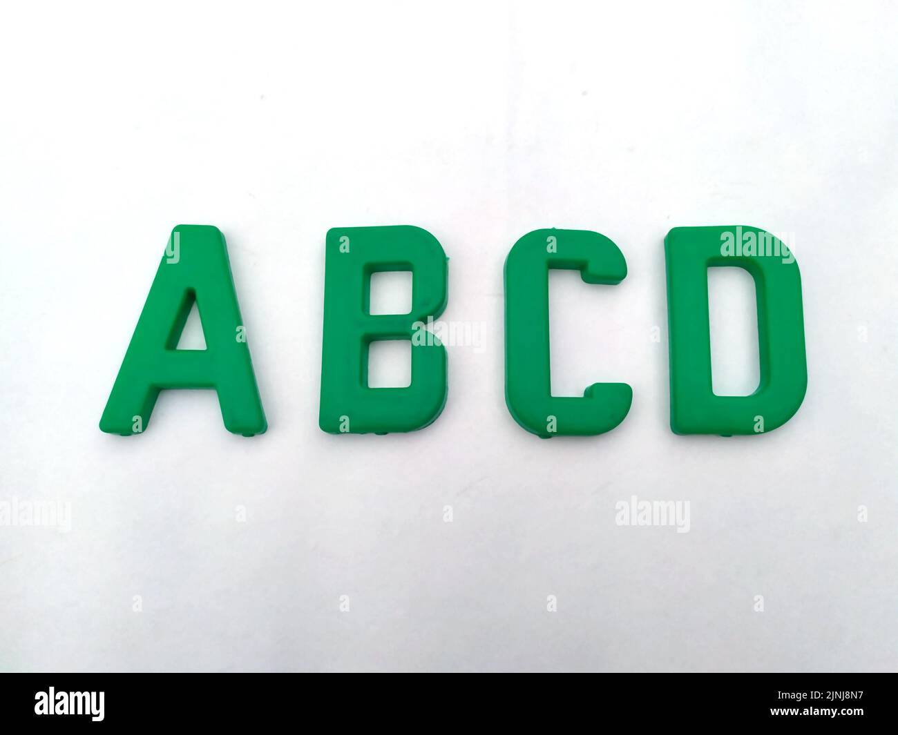 plastic letter isolated on white background Stock Photo - Alamy