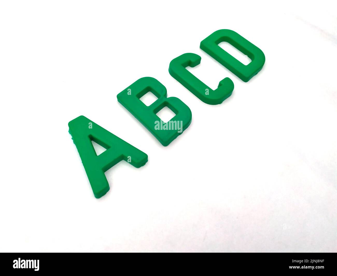 plastic letter isolated on white background Stock Photo - Alamy