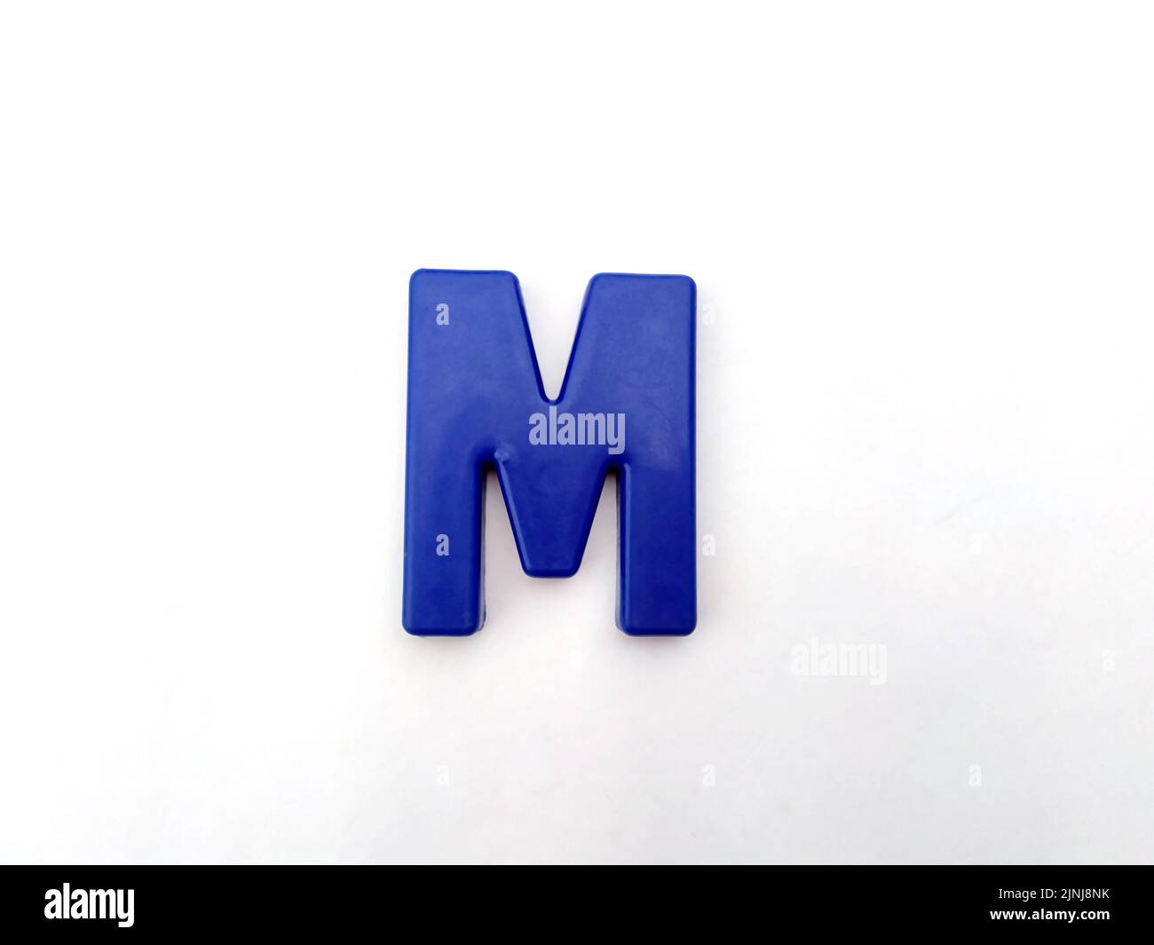 plastic letter isolated on white background Stock Photo - Alamy