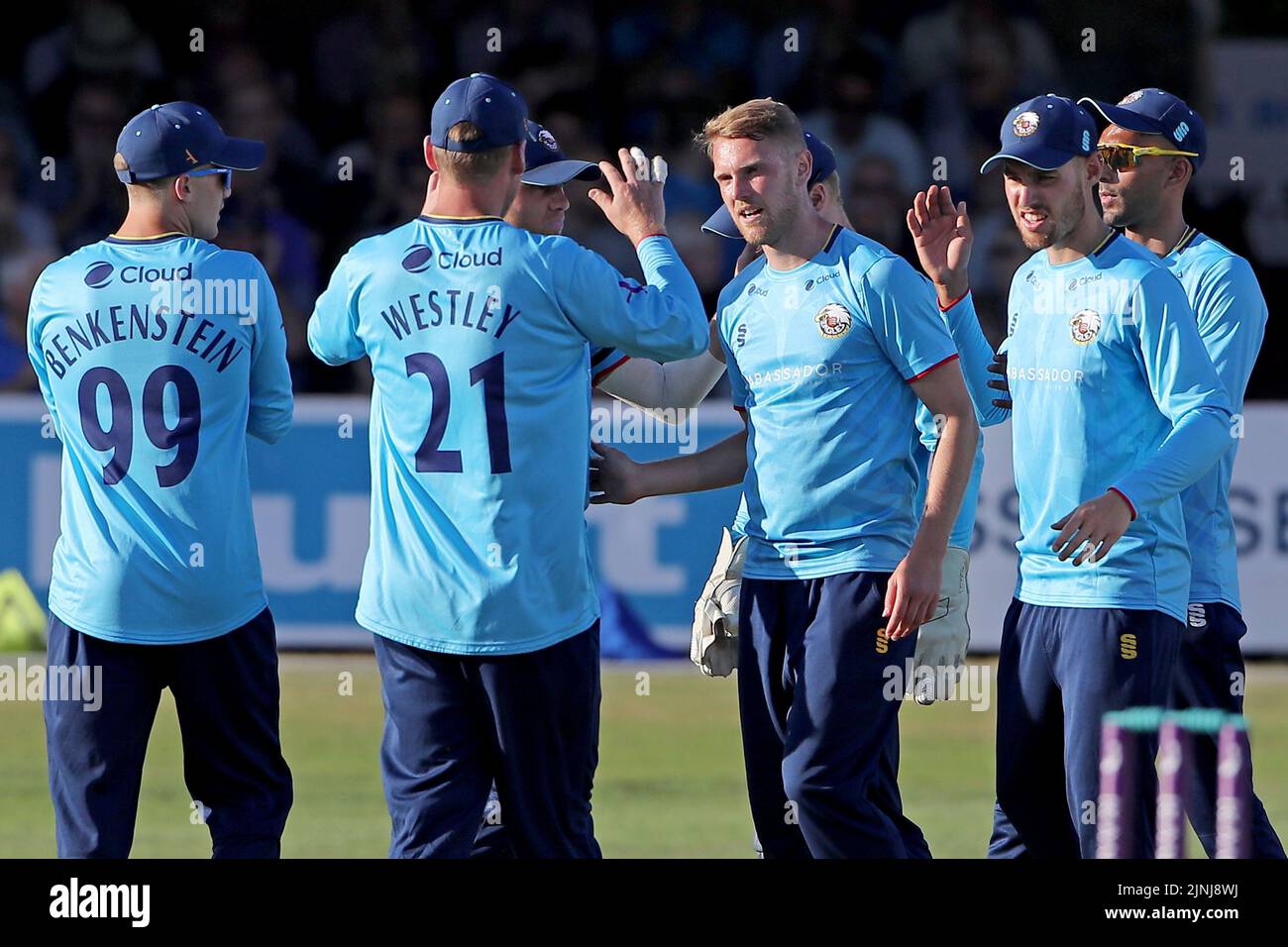 Jamie Porter of Essex celebrates with his team mates after taking the ...