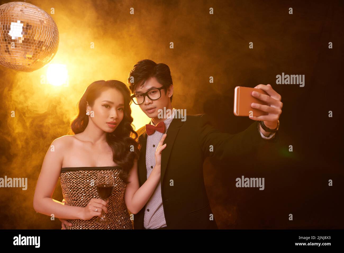 Group portrait of attractive young woman and her handsome boyfriend ...