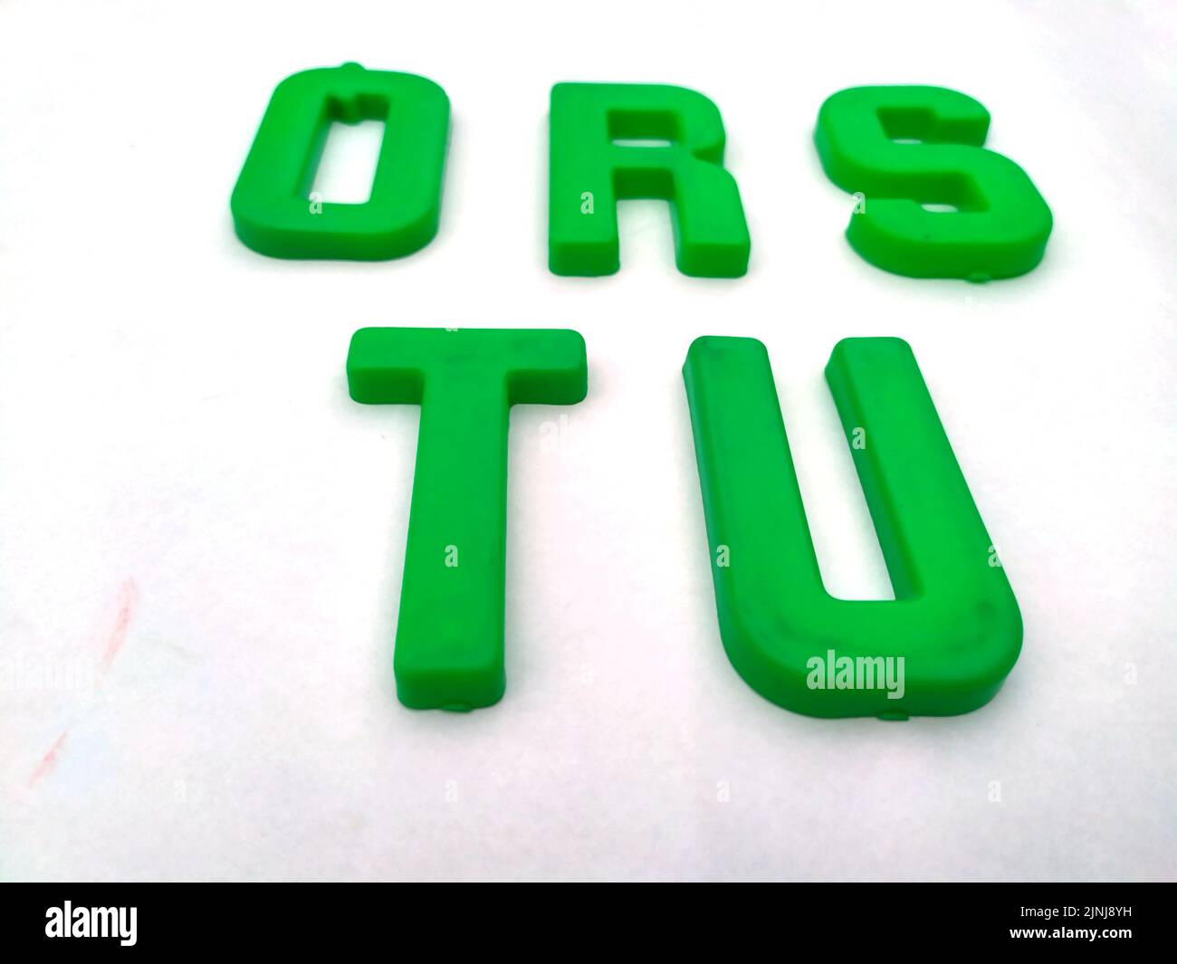 plastic letter isolated on white background Stock Photo - Alamy