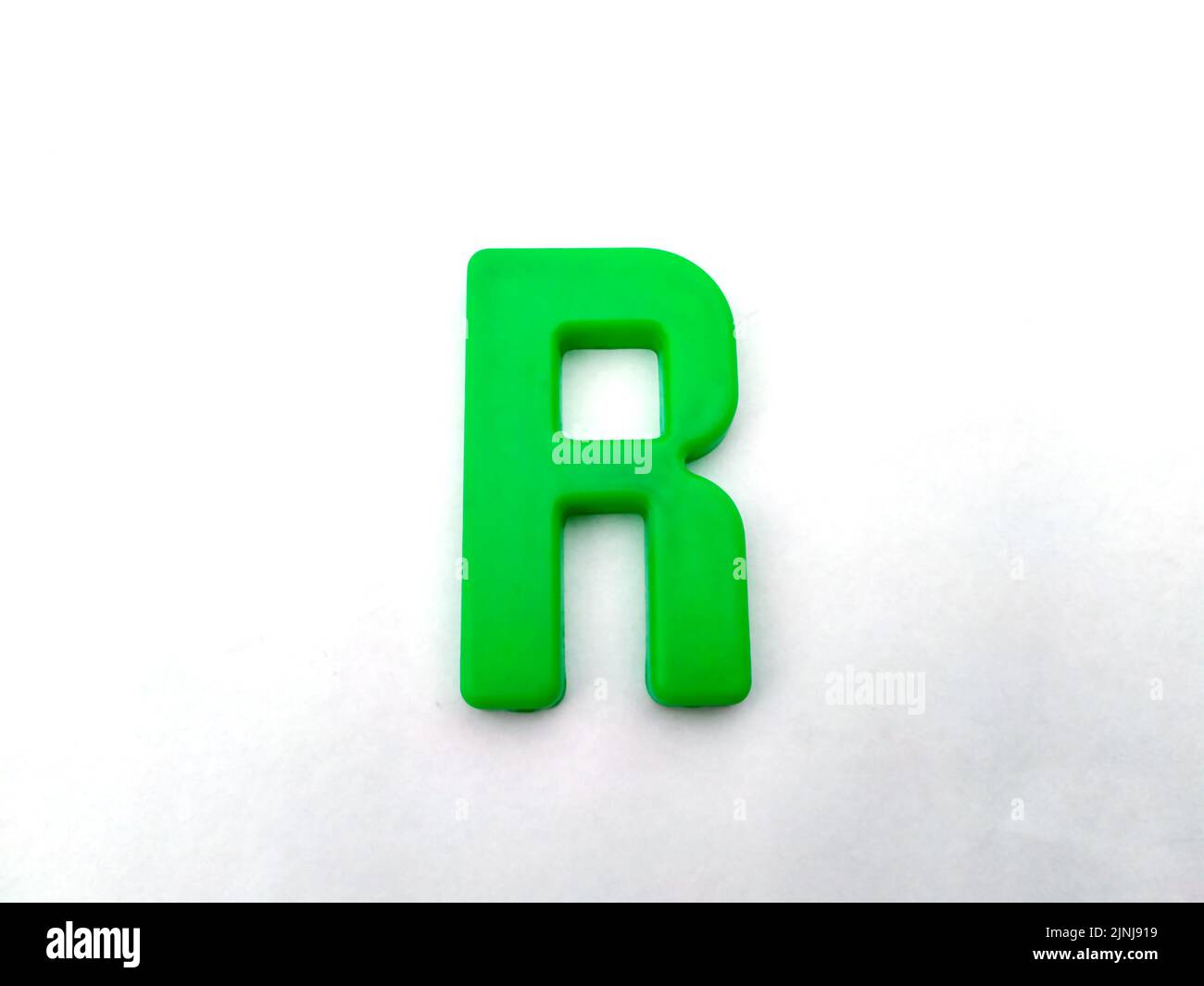 plastic letter isolated on white background Stock Photo - Alamy