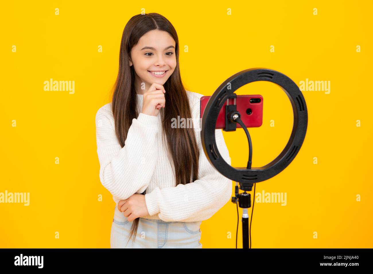 Blogging, videoblog. Teenager child blogger with phone recording video ...