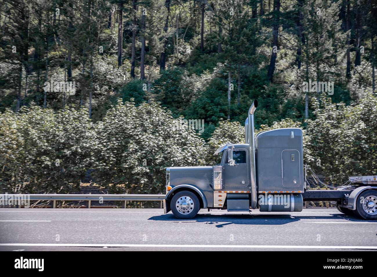 Industrial gray classic big rig semi truck tractor with extended cab ...