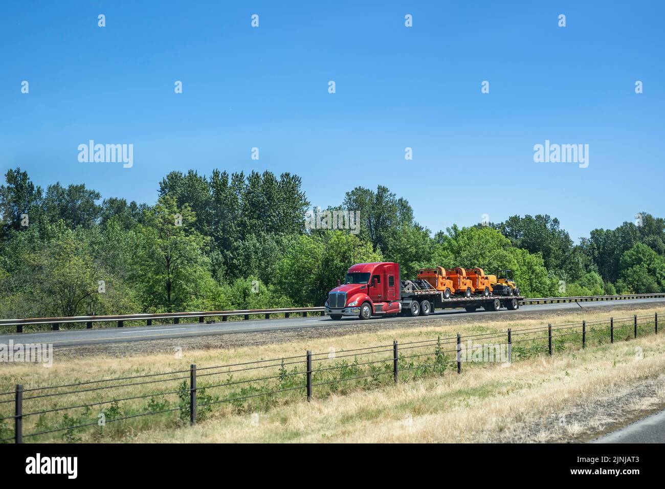 Industrial burgundy classic big rig semi truck tractor with extended ...