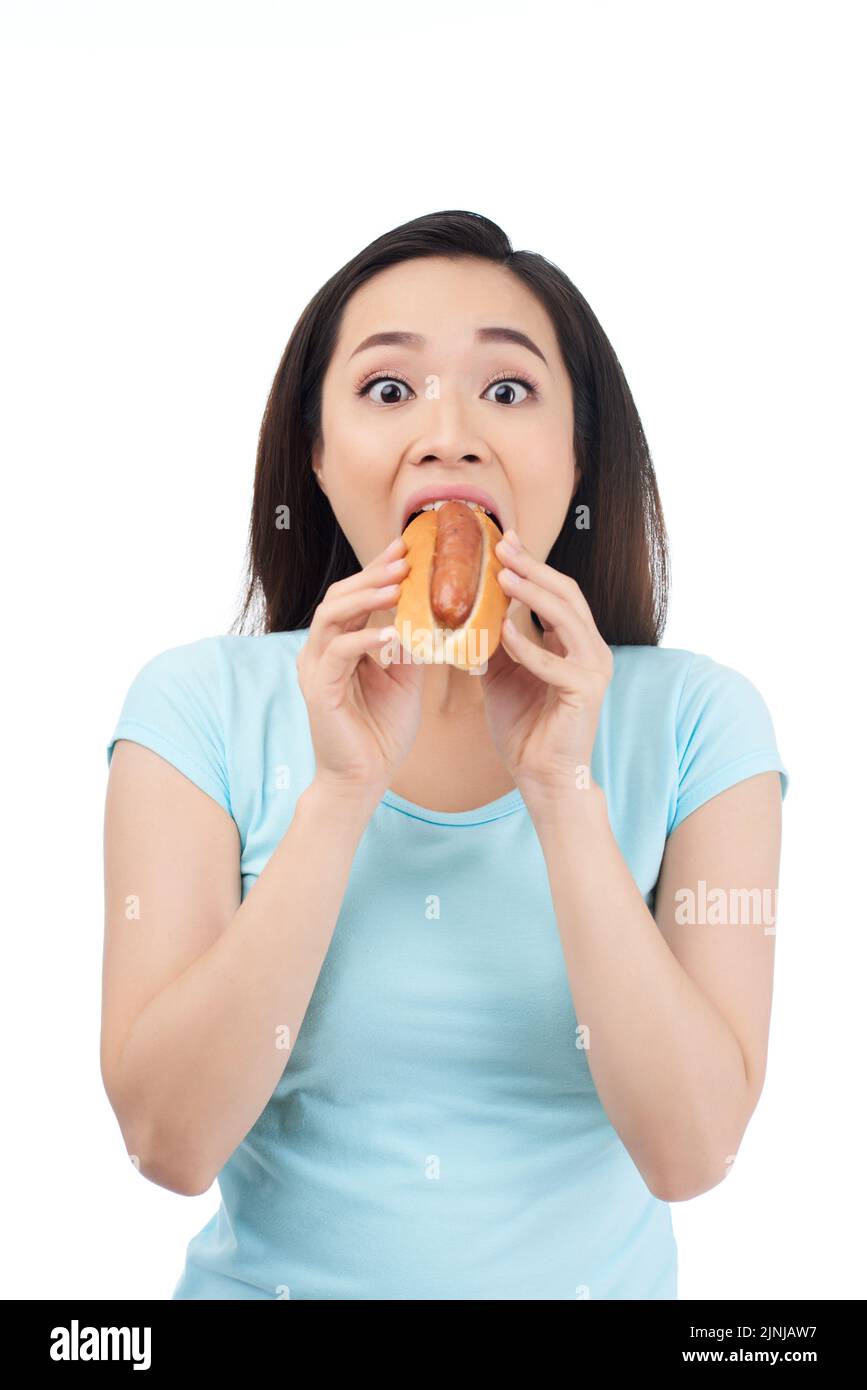 Portrait woman eating hot dog hi-res stock photography and images - Alamy