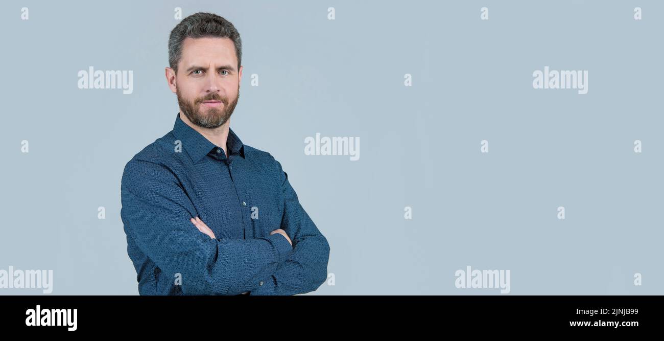 You can always be confident. Confident man keep arms crossed grey ...