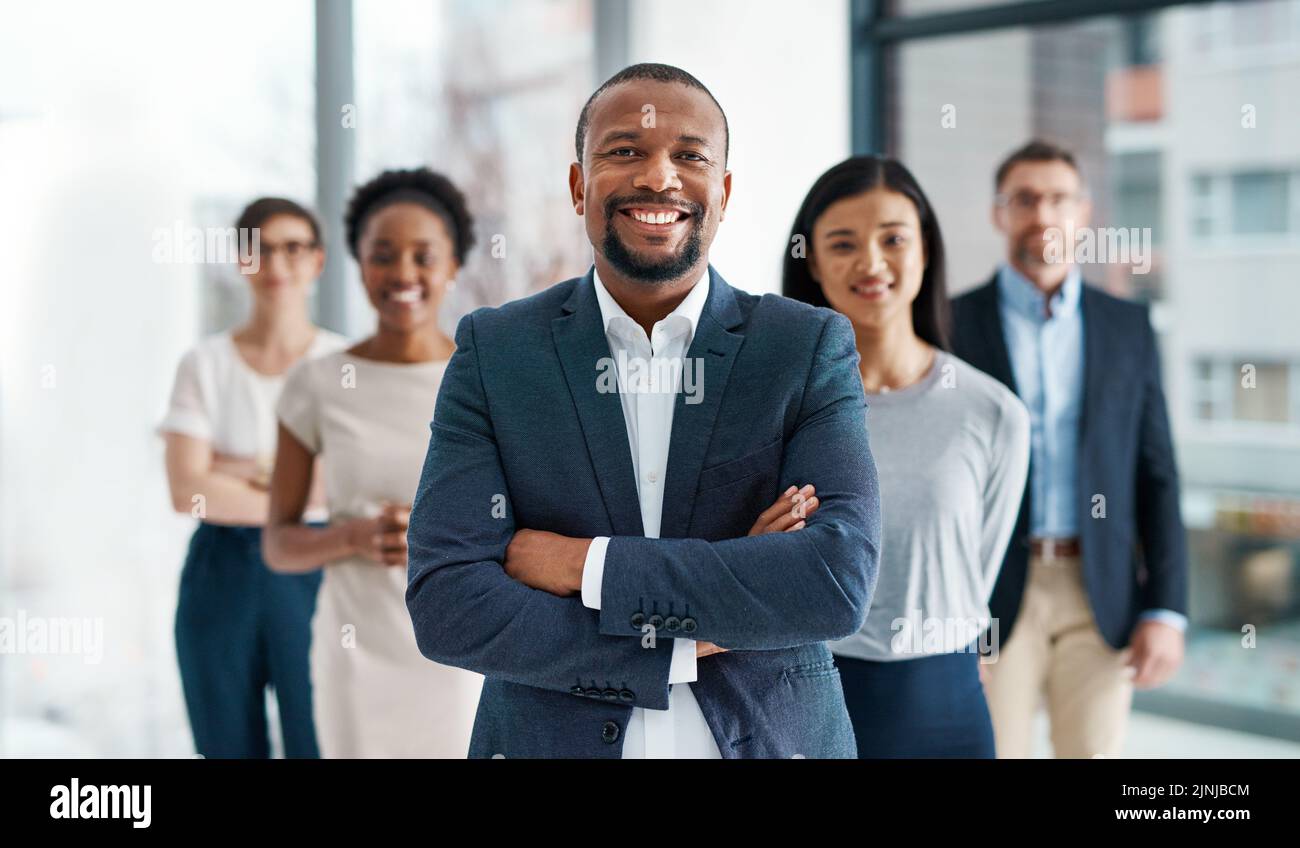 Professional, diverse and successful business team smiling and standing ...