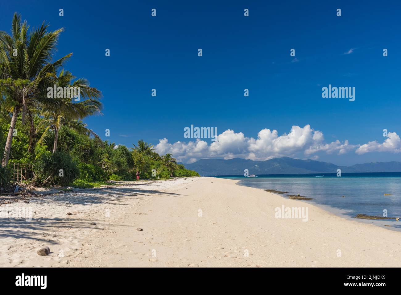 The beautiful view of the sandy shoreline and sea. Bon Bon Beach ...