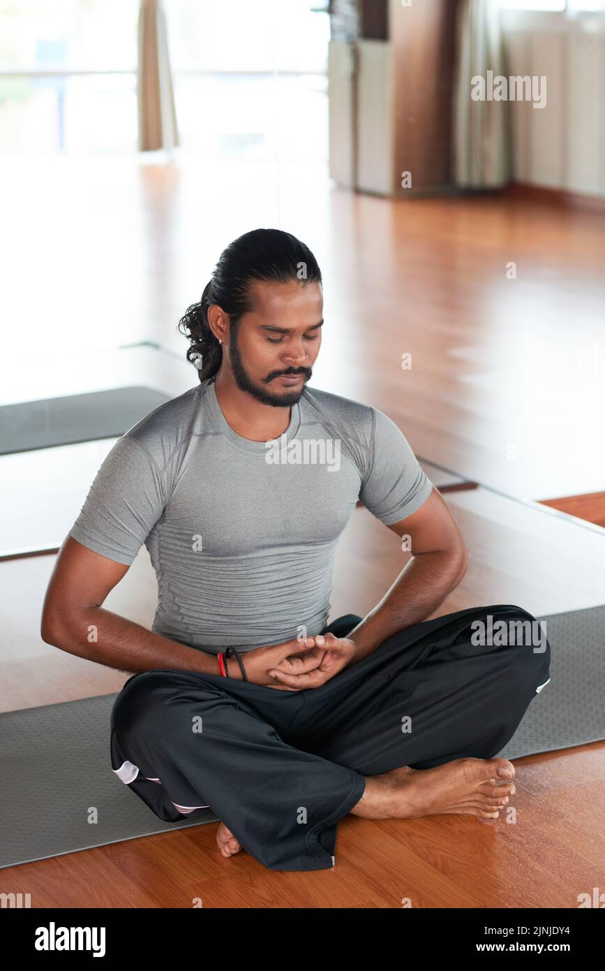 Indian yogi concentrated on his breath during yoga practice Stock Photo ...