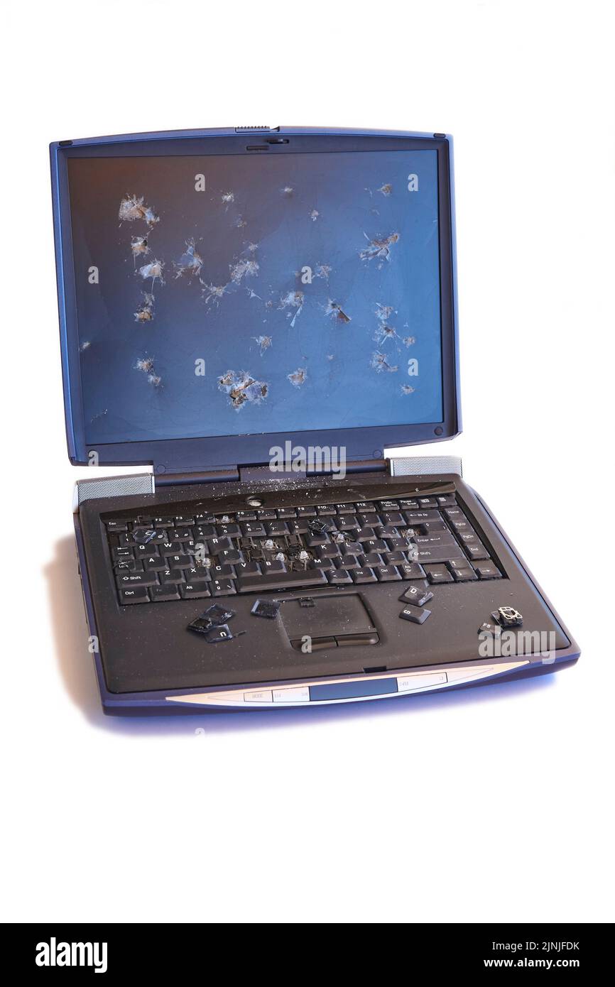 Broken screen and keyboard laptop isolated on white. Damaged device ...