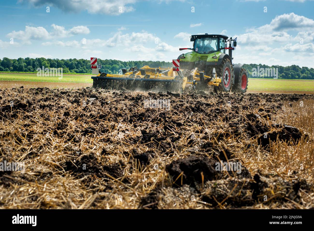 fragment of soil after in work of heavy disc harrow on a field ...