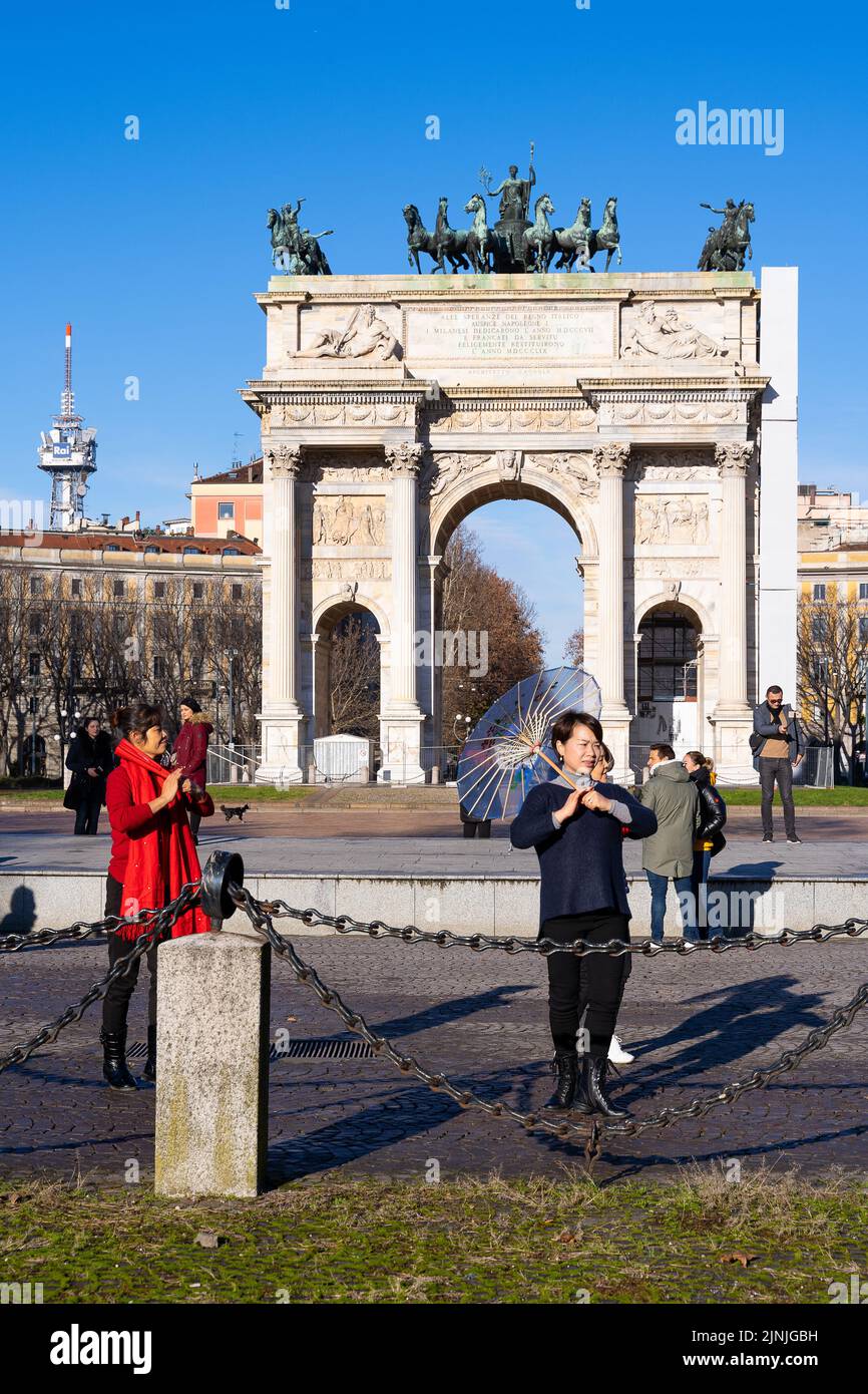A view of Arch of Peace surrounded by trees in Milan Stock Photo - Alamy